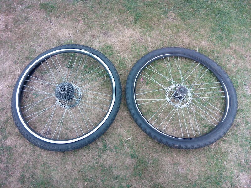 Pair of 26" wheels on Quando hubs 7 speed cassette For Sale