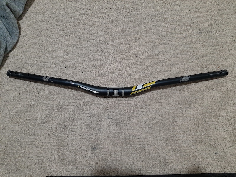 Nukeproof warhead handle bars 31.8 black and yellow. For Sale