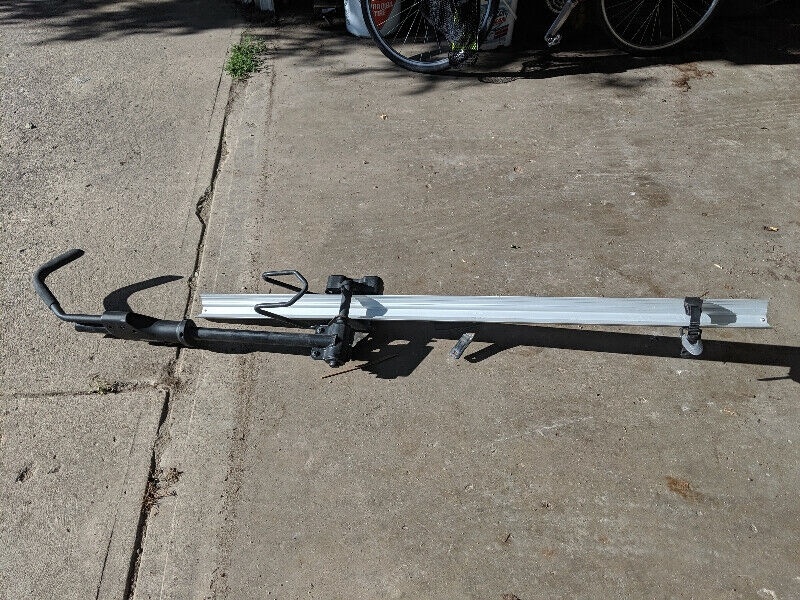 Thule 594XT Sidearm Rooftop bike rack for sale. For Sale