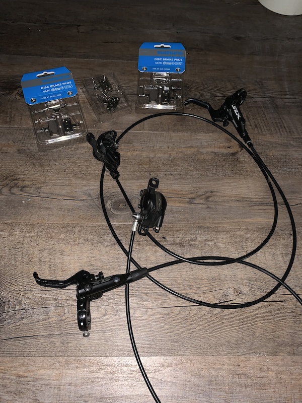 2018 Shimano SLX brakes - with three sets of Shimano pads! For Sale