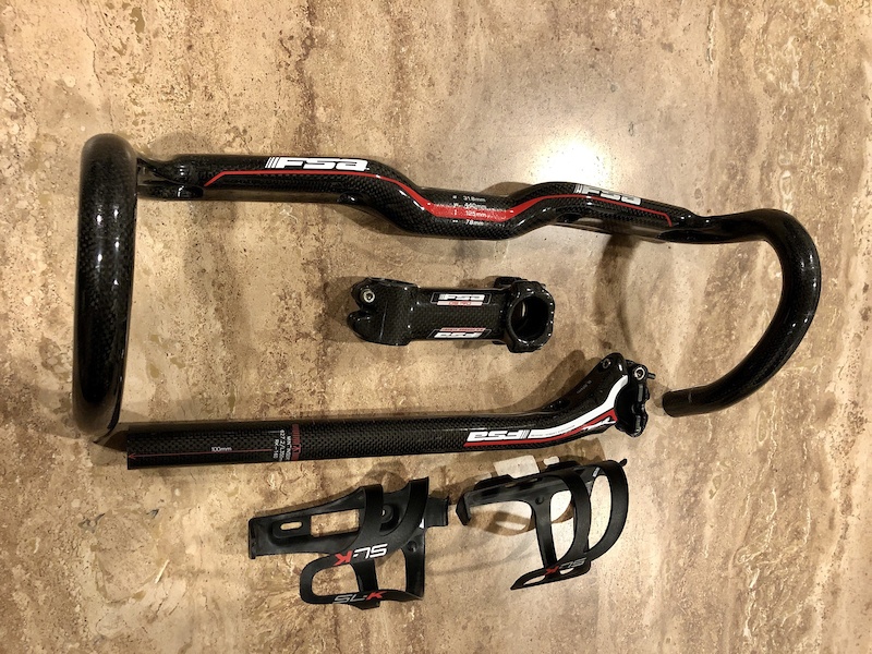 FSA Carbon kit, seatpost, stem, handlebar, cages For Sale
