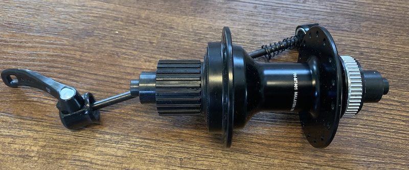 2020 -2764- SHIMANO DEORE Rear Hub 135mm OLD 12s For Sale