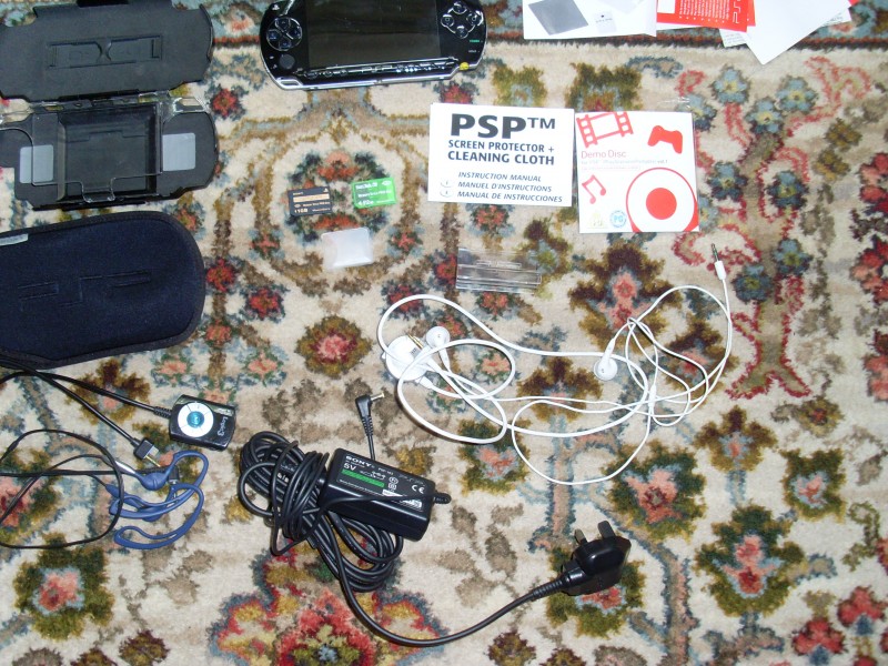 PSP With 5 Games And 2 Memory Cards! All Boxed With Extras For Sale