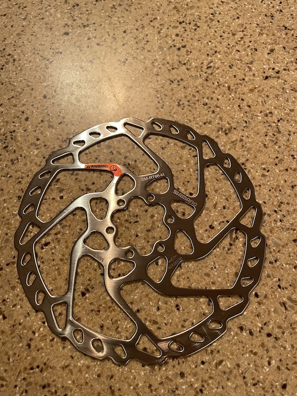 2023 Shimano SM-RT66 6-Bolt Disc Brake Rotor - 180 mm For Sale