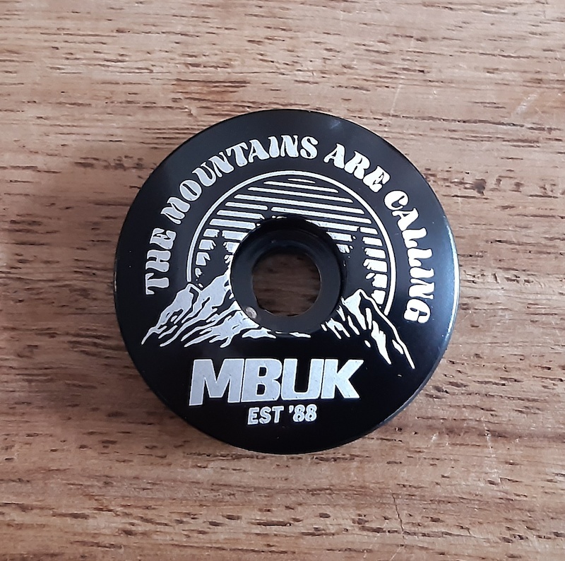 2021 'The Mountains Are Calling' Stem Top Cap [MBUK] For Sale
