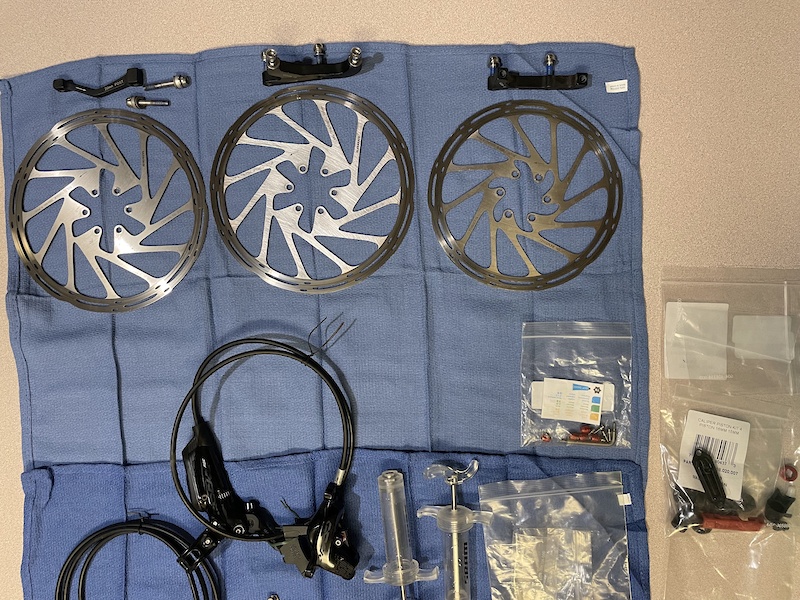 SRAM Code RSC + rotors, mounts, SRAM pro bleed kit For Sale