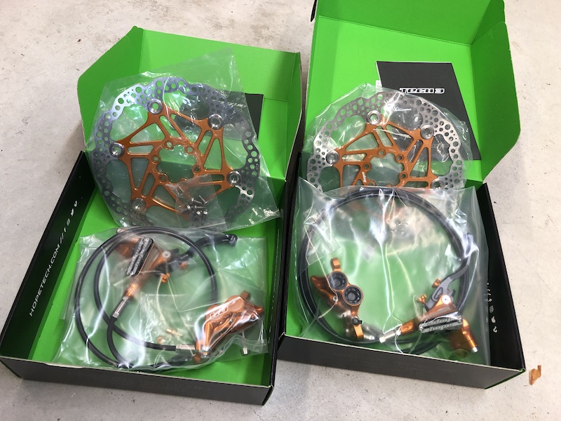 2022 HOPE Tech 3 E4 Brakeset w/ 180mm Rotors (Orange) For Sale