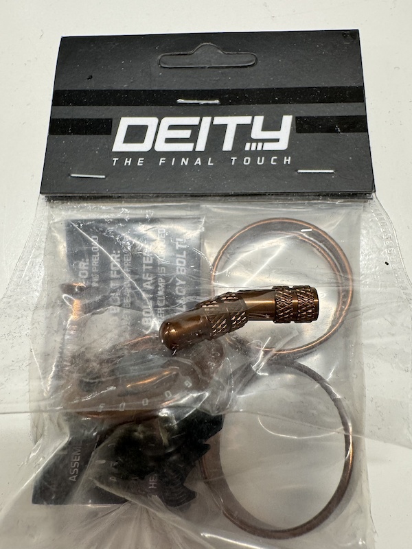 Brand new Deity valve stem caps/headset cap - Bronze For Sale