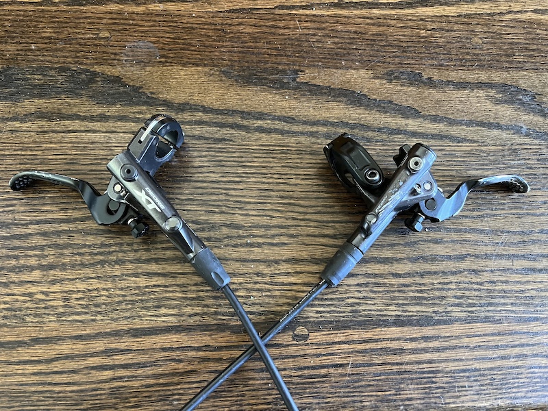 2022 Mixed Shimano Deore XT brakeset (4 piston/2 piston) For Sale