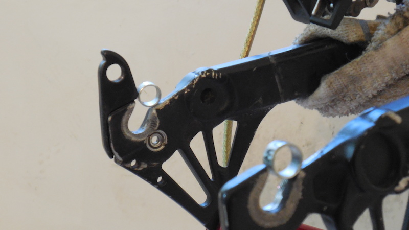 re-aligning rear tire/axle in swingarm on Jamis Dakar. Wheel is crooked ...