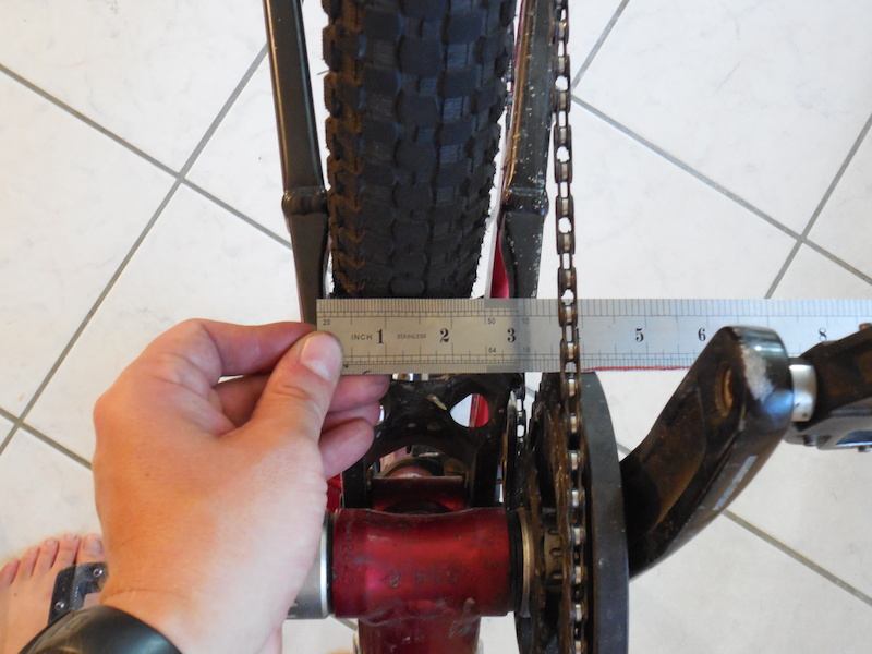 re-aligning rear tire/axle in swingarm on Jamis Dakar. Wheel is crooked ...